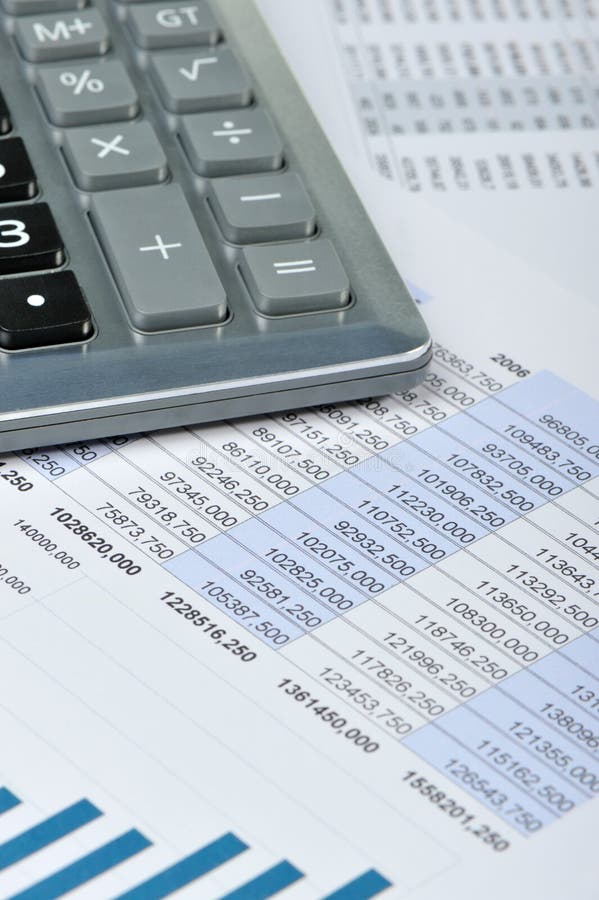 The Calculator and the Financial Report Stock Photo - Image of ...