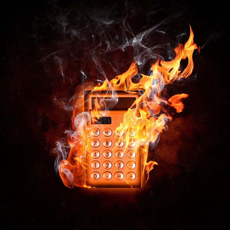 Calculator in fire stock photo. Image of office, digital - 33385392