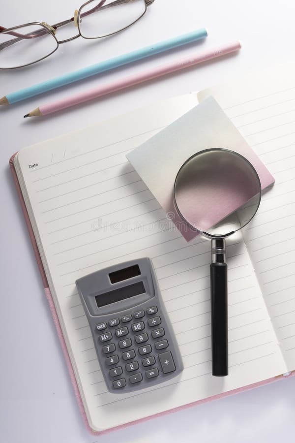 Calculator, Glasses, Pen and Notebook on the Table, Financial Organizer ...