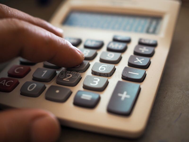 Calculator with hands stock photo. Image of financial - 183359732