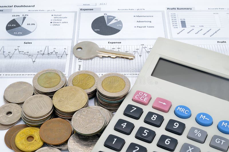 Calculator, Key and Stack of Coins on Paper of Financial Graph Stock ...