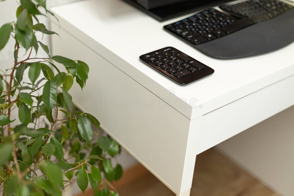 Calculator and Keyboard on White Desktop Surface, Top View Stock Photo ...
