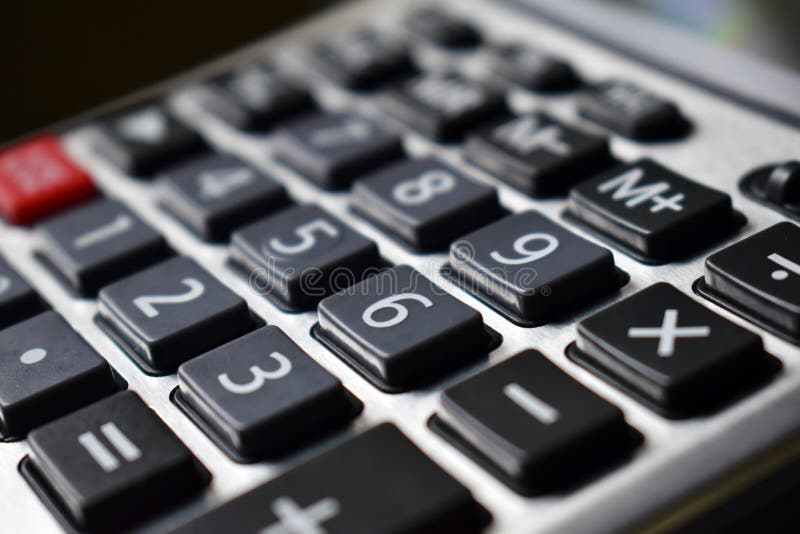 Calculator Black Keys with White Numbers and One Red Button Stock Photo ...