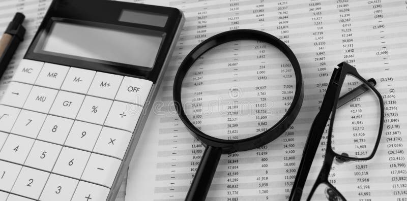 Calculator, Magnifying Glass, Pen, Eye Glasses on Financial Statement ...
