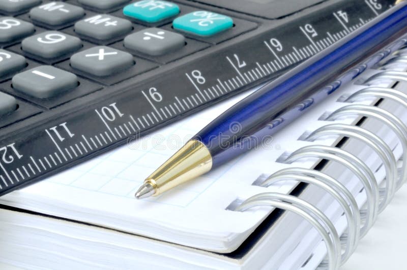 Calculator and notebook stock image. Image of office - 16316261