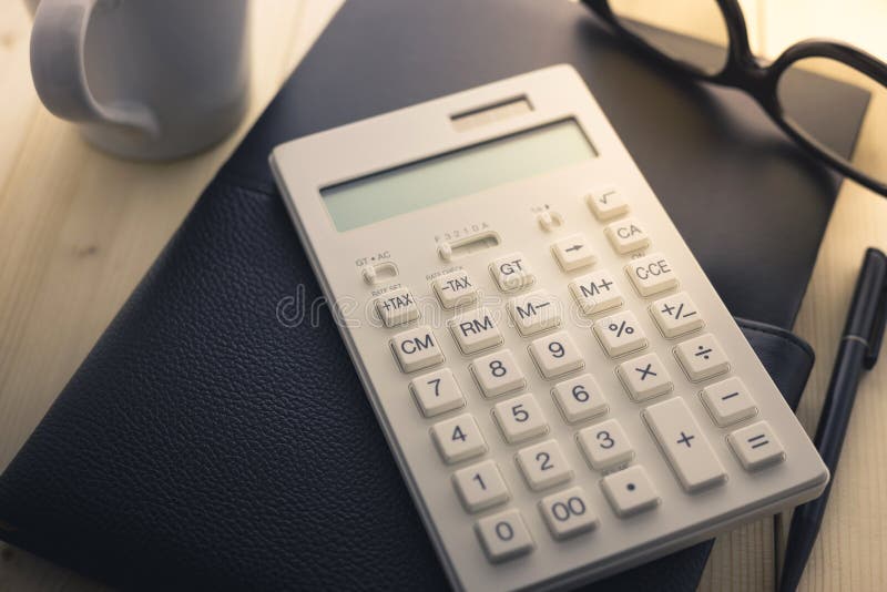 Calculator and Notebook stock photo. Image of mathematics - 79135442