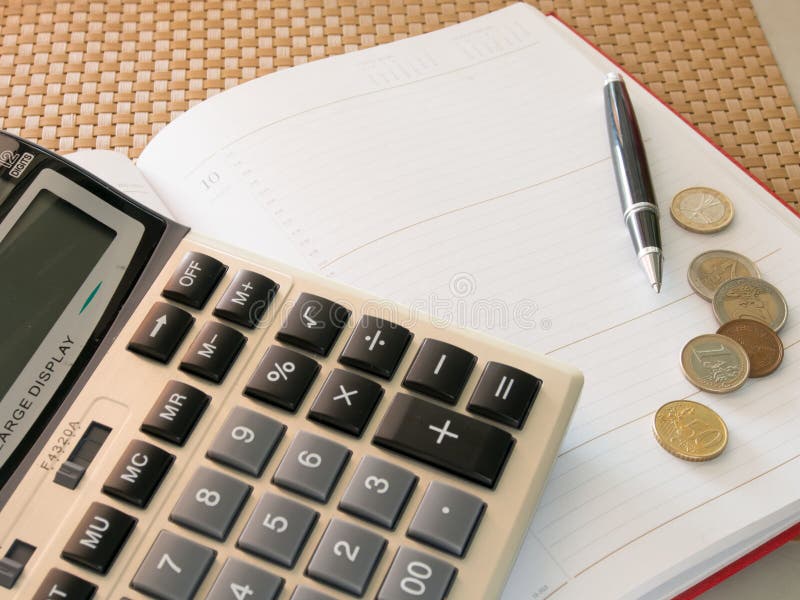 Calculator with notebook stock image. Image of closeup - 35593357