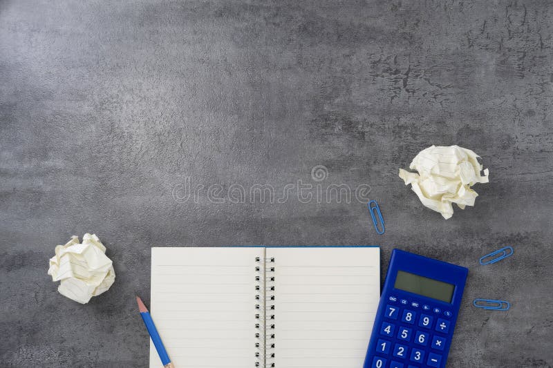 Calculator and Notebook on Stone Texture Background. Flat Lay of a ...