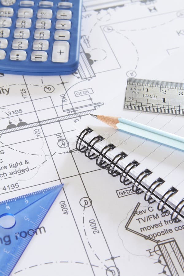 Calculator, Notepad and Drawing Tools Arranged on Plans Stock Photo ...