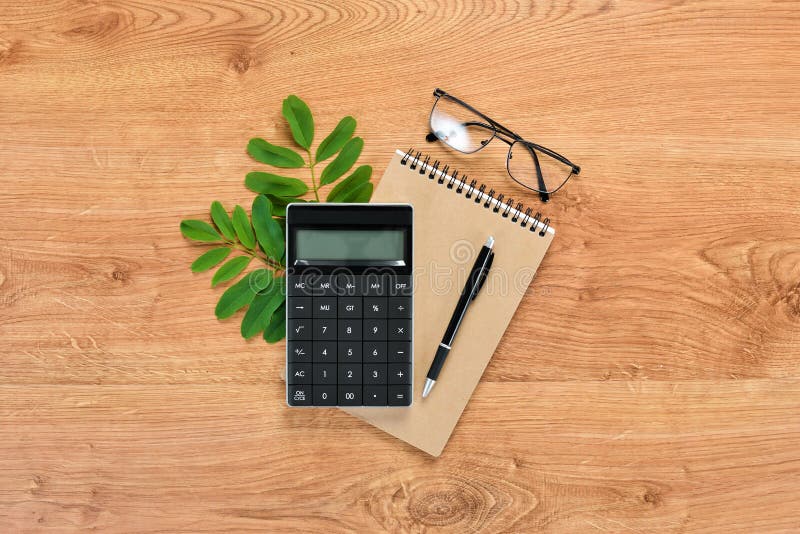 Calculator and Office Accessories on Office Desk. Stock Image - Image ...