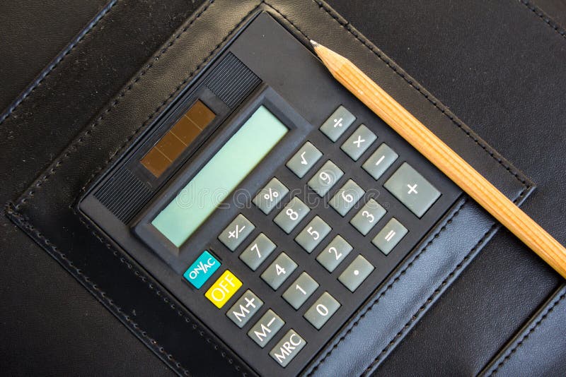 Calculator and pen stock photo. Image of corporate, marketing - 28298544