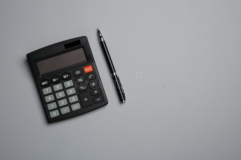 Calculator and Pen on Light Grey Background, Flat Lay with Space for ...