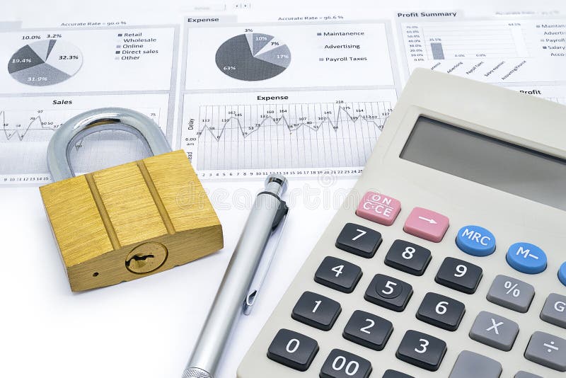Calculator, Pen and Master Key Put on Financial Dashboard Stock Photo ...