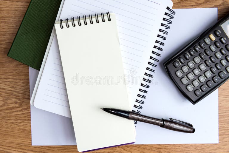 Calculator, Pen and Notebook on Wooden Table Stock Image - Image of ...