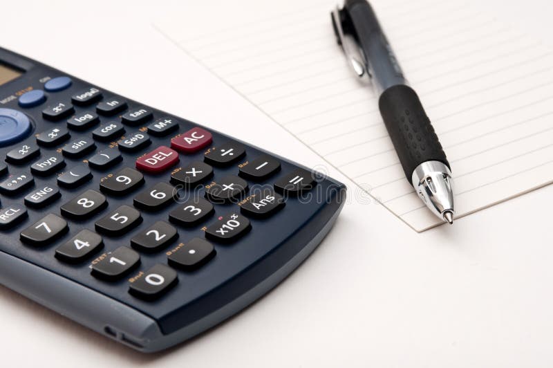 Calculator, pen and paper stock photo. Image of electronics - 12375688