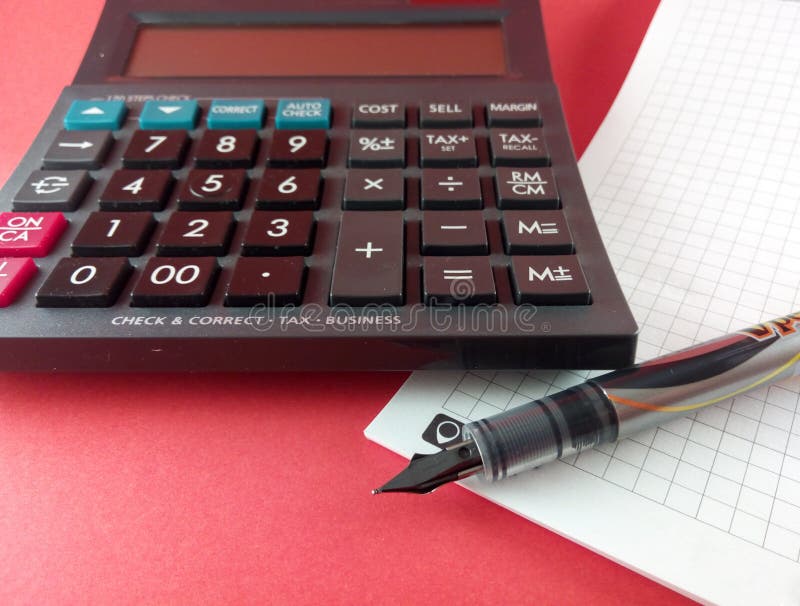Calculator and Pen on Paper Notepad Stock Photo - Image of classic ...