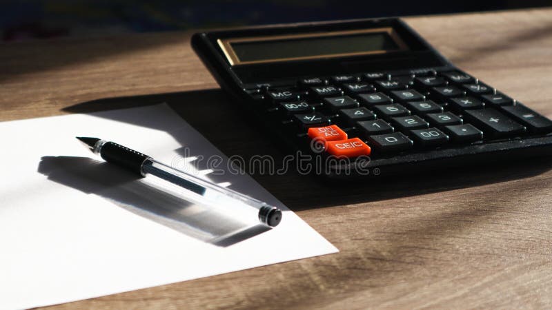 Calculator and Pencil with Shadow Light. Office Desk Table with ...