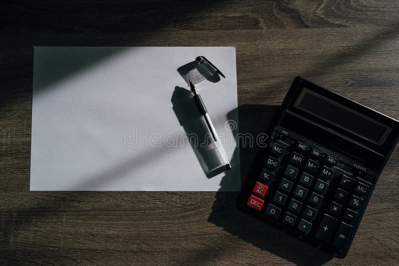 Calculator and Pencil with Shadow Light. Office Desk Table with ...