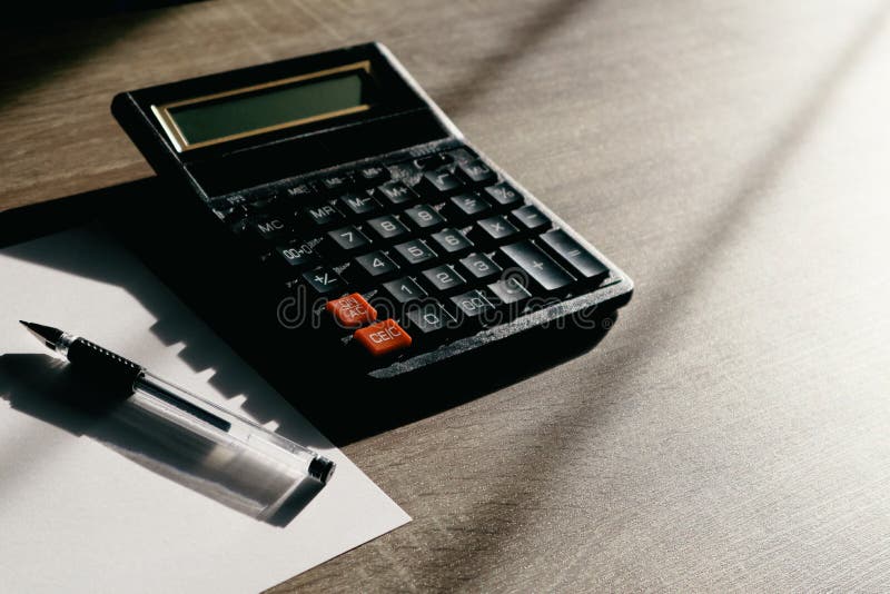 Calculator and Pencil with Shadow Light. Office Desk Table with ...