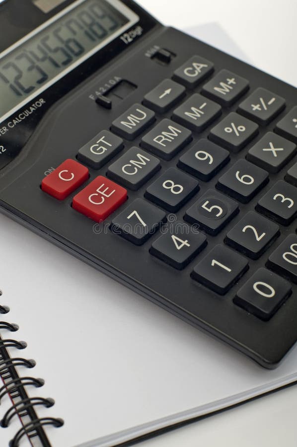 Calculator and Ink Pen on Paper Notepad Stock Image - Image of ...