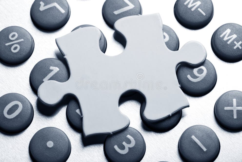 Calculator and Puzzle stock photo. Image of jigsaw, concepts - 214513438