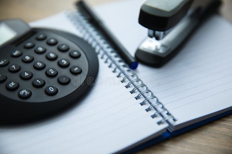 Calculator with Stationary on Notepad Stock Image - Image of office ...