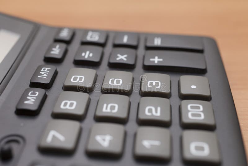 The calculator on a table stock image. Image of calculate - 82223789