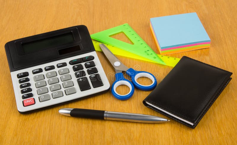 Calculator, Tablet Computer with Chart and Graphs, Notepad Stock Image ...