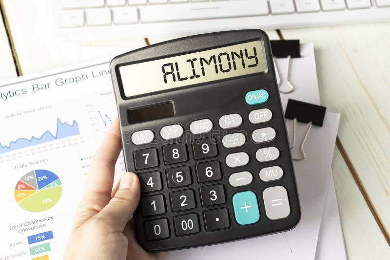 Word ALIMONY Written on Calculator on Office Table Stock Image - Image ...