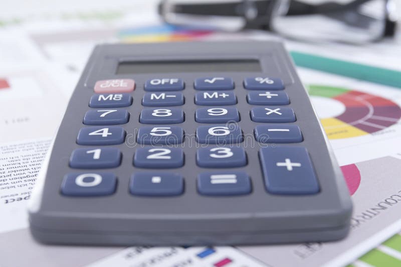 Calculator on the Worktable Stock Photo - Image of report, foreground ...