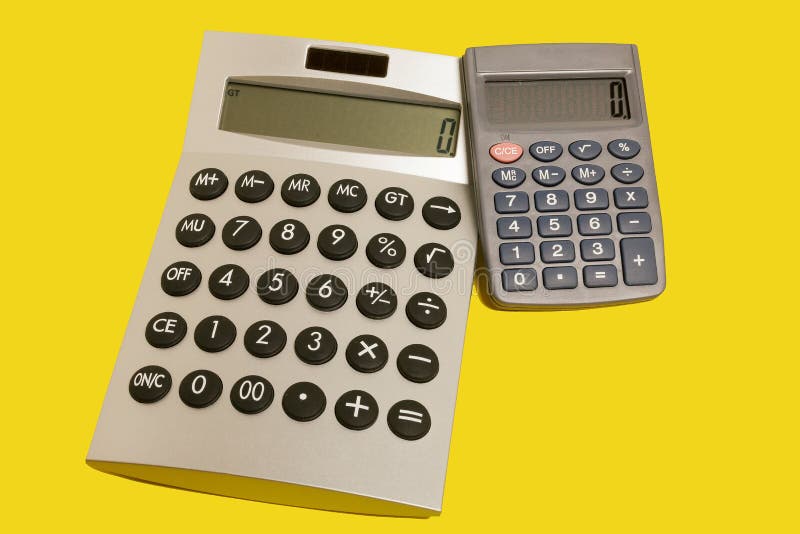 Calculators on a Yellow Surface Stock Photo - Image of keypad, maths ...