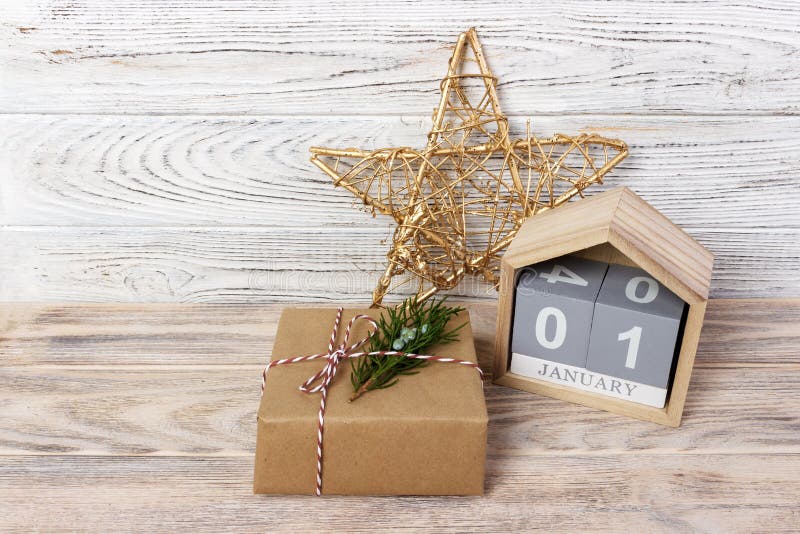 Calendar with Date and Gift Boxes on Wooden Background. Christmas ...