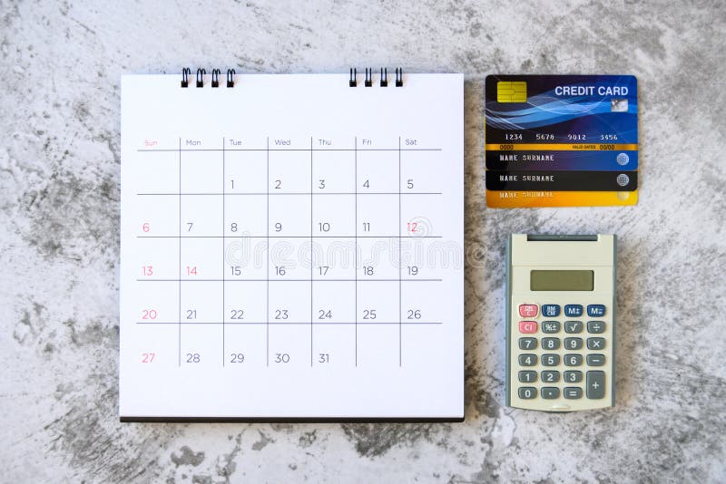 Calendar with Days and Credit Card on Table. Shopping Concept Stock ...