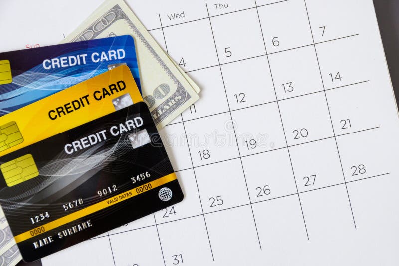 Calendar with Days and Credit Card on Table. Shopping Concept Stock ...