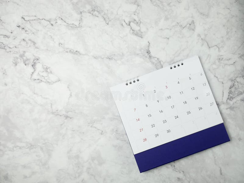 Calendar on marble texture stock photo. Image of decor - 213717202