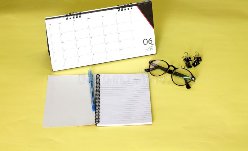 Calendar with a Note Lies on a Wooden Table Stock Image - Image of ...
