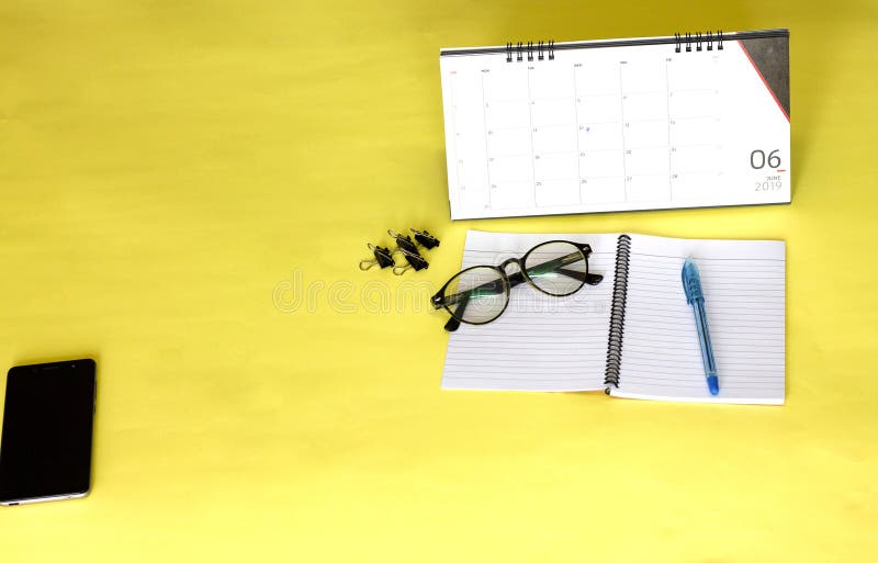 Calendar with a Note Lies on a Wooden Table Stock Image - Image of ...