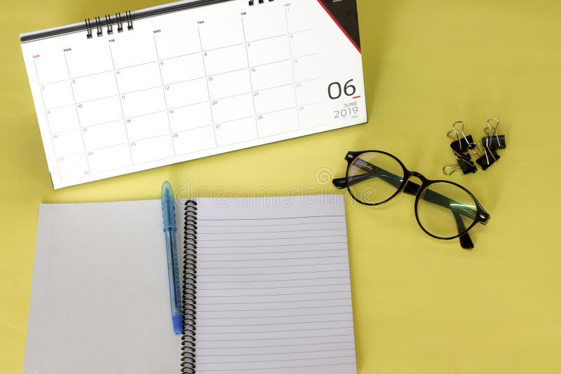 Calendar with a Note Lies on a Wooden Table Stock Image - Image of ...