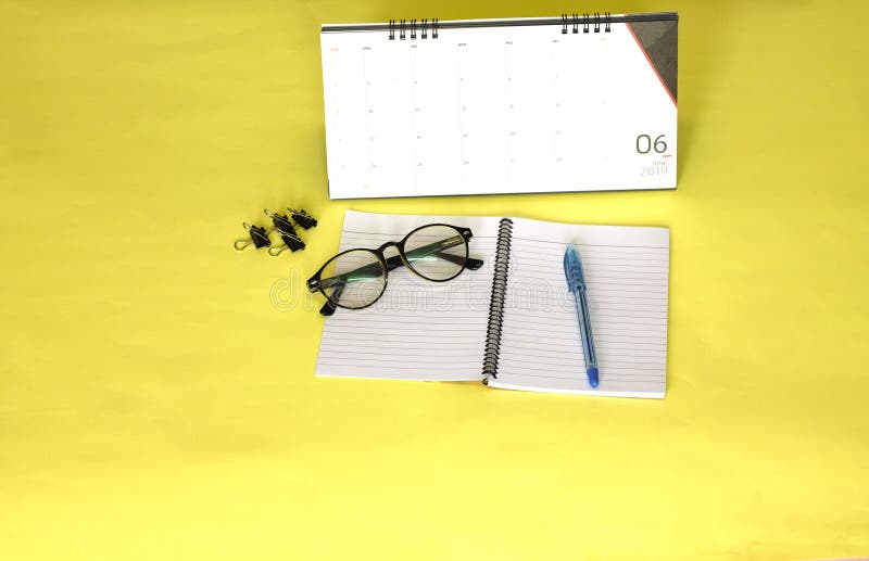 Calendar with a Note Lies on a Wooden Table Stock Image - Image of ...