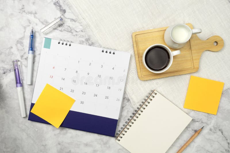 Calendar with Note Paper and Coffee on Marble Texture Background. Plan ...