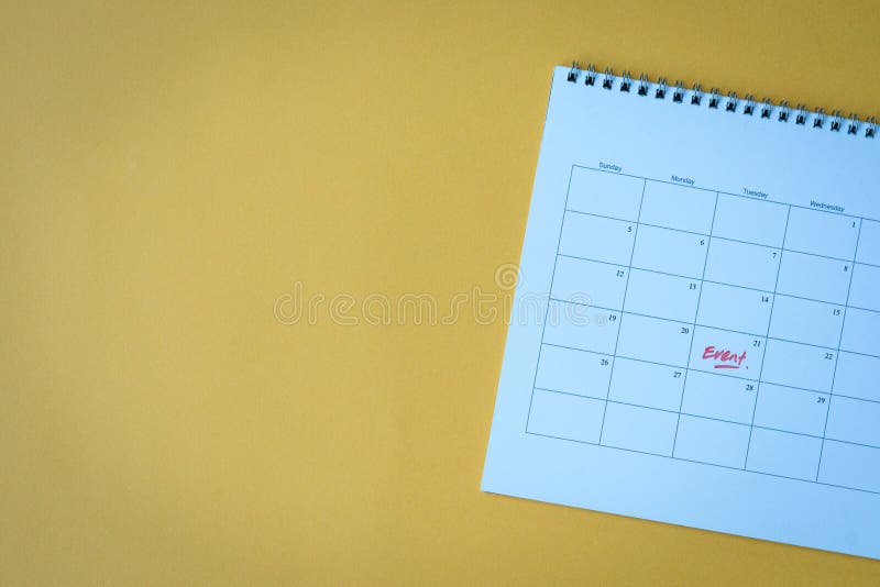 Calendar Page with Event Reminder, on Top of Yellow Surface Stock Image ...