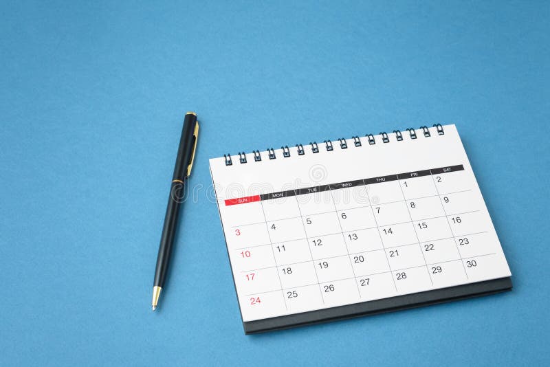 White Calendar with Pen on Blue Background Stock Image - Image of ...