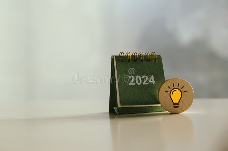 Calendar Sheet with Light Bulb Stock Photo - Image of creative, finance ...