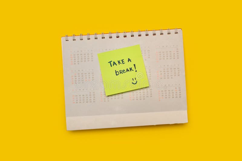 Calendar with a Sticky Paper with Take a Break Phrase and a Smiley Face ...
