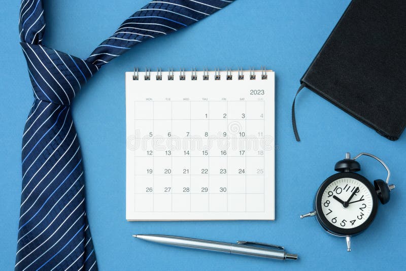 Scheduling and Planning Concept, Calendar with Green Pin, Pen and Clock ...