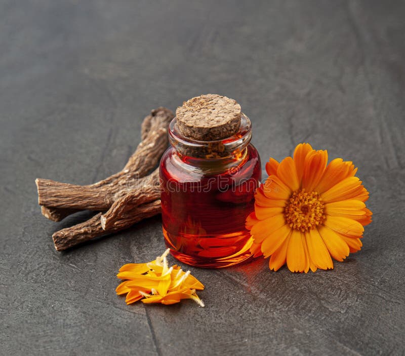 Calendula Supplement with Flower and Root Stock Image - Image of ...