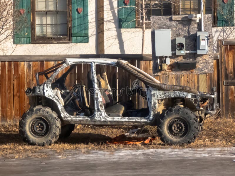 A Off-roading Car Sits Abandoned in a Yard. Its Skeleton-like Frame and ...