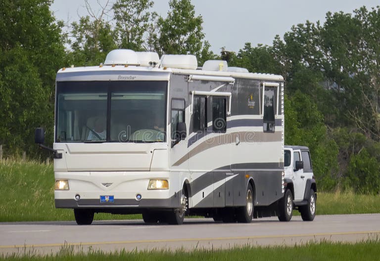 A RV Camper Trailer on the Route during Springtime Editorial ...