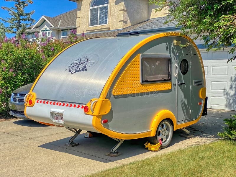 A Teardrop Camping Trailer Parked in Front of a House Editorial Image ...