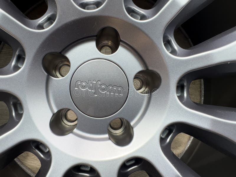 A Close-up of a Silver Rotiform Wheel, Highlighting Its Multi-spoke ...